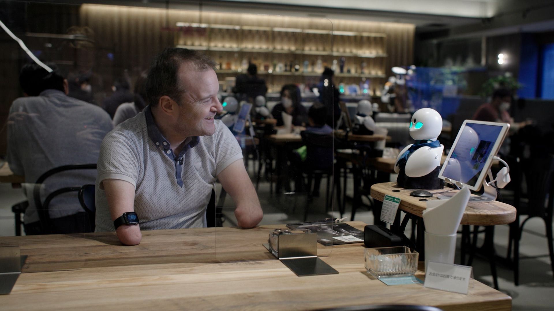 Dining with robots operated by disabled workers in Tokyo - BBC Reel