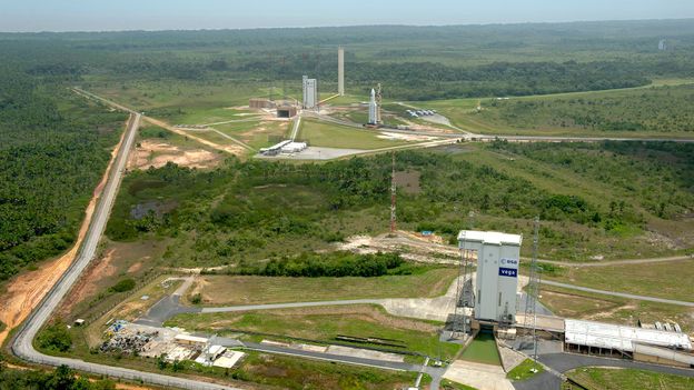 The rocket tower being built in tropical jungle