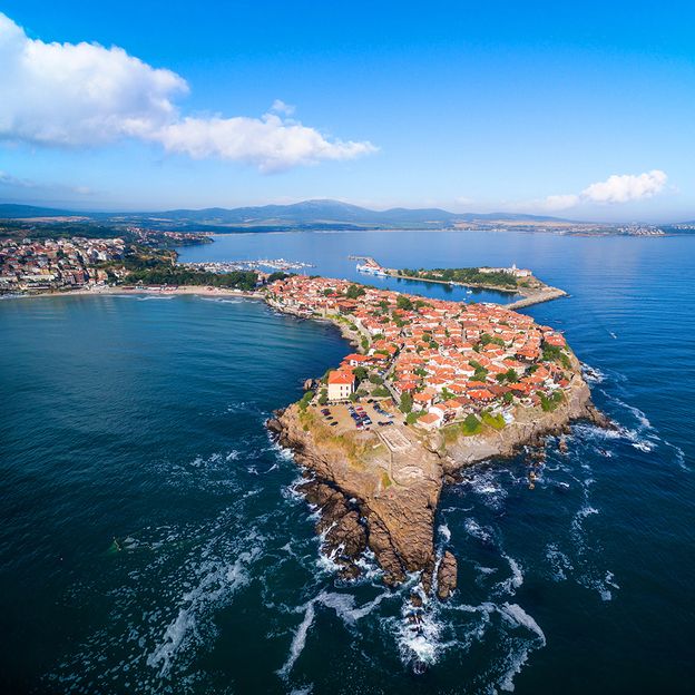 A 'mini-Greece' by the sea with a treasure trove just off the shore ...