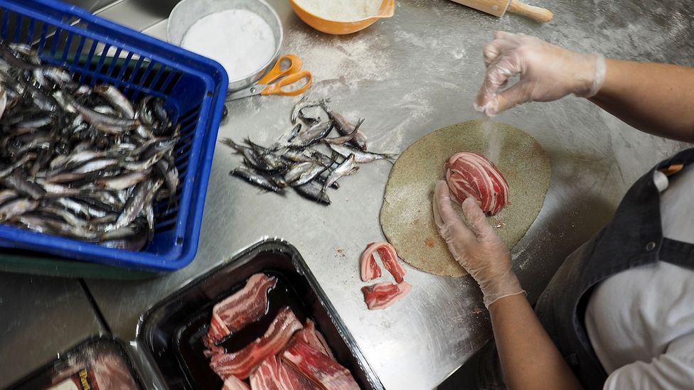 Where loaves of bread are baked with fish - BBC Travel